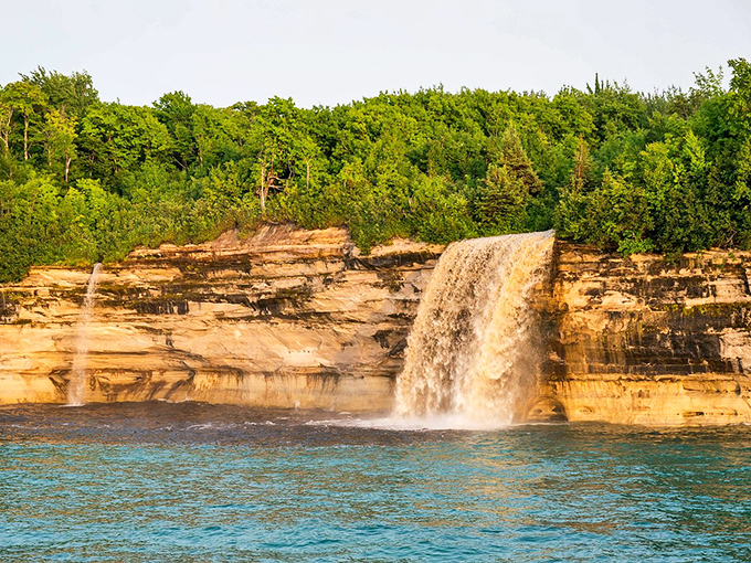 Spray Falls makes a dramatic 70-foot plunge into Lake Superior's turquoise waters, nature's version of a perfect dive.
