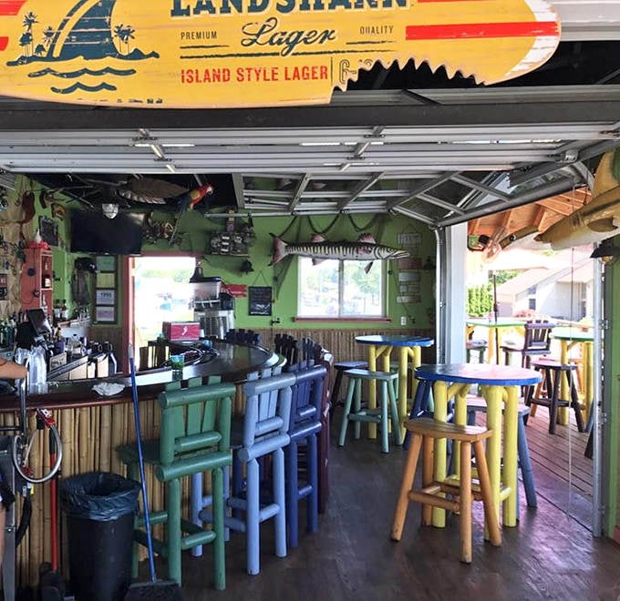 Pull up a rainbow-hued stool at this bamboo-trimmed bar, where island vibes flow as freely as the cocktails being mixed.