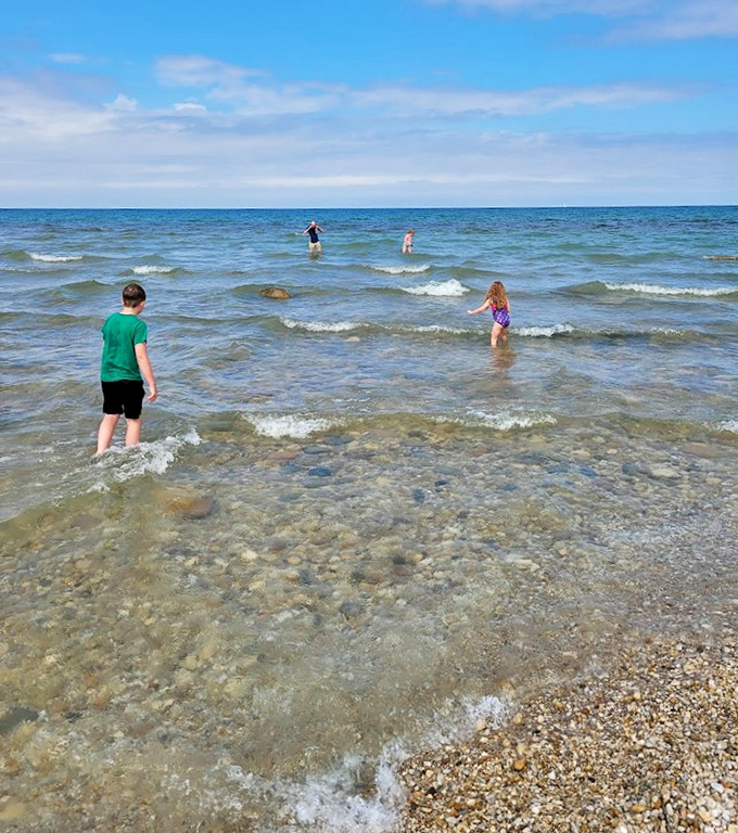 The shallow swimming area invites visitors of all ages to wade into Lake Huron's refreshingly clear waters &ndash; nature's stress-relief therapy in liquid form.