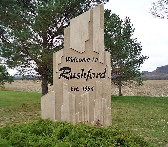 The welcome sign stands proud since 1854, greeting visitors with the same warmth that defines this charming riverside community.
