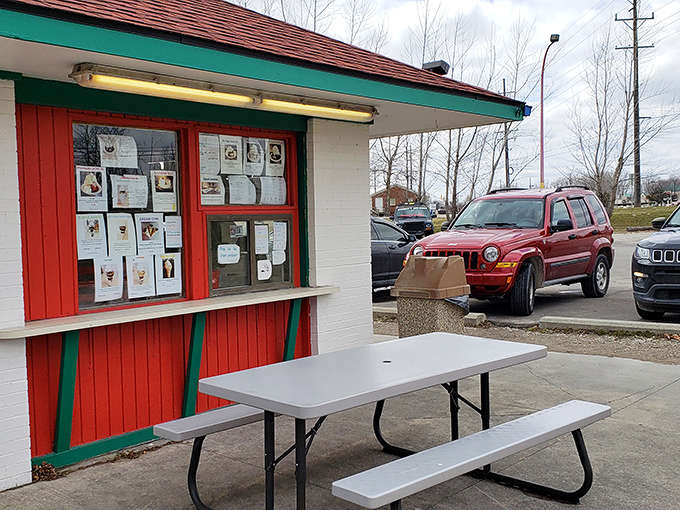 The humble ordering window with its cheerful red trim belies the extraordinary treats that emerge from this unassuming custard headquarters.