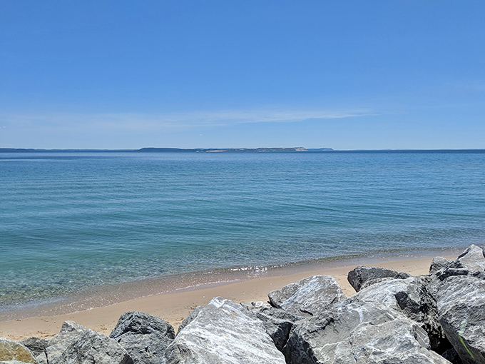 Beach view: Squeaky-clean sand meets Caribbean-blue waters at this hidden Michigan shoreline. Who needs a passport when paradise is hiding in the Great Lakes?