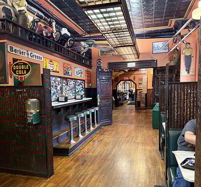 Step inside and travel back in time &ndash; the vintage interior features original woodwork, memorabilia-covered walls, and that unmistakable aroma of Michigan's best chili dogs.