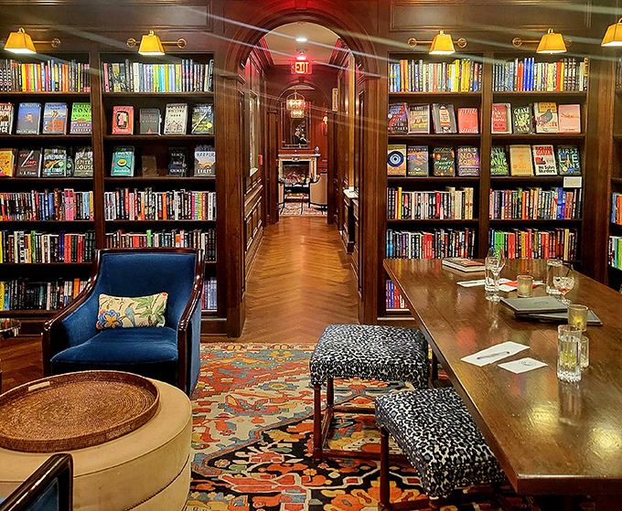 Floor-to-ceiling bookshelves meet sophisticated design in a space that makes you want to read everything at once.