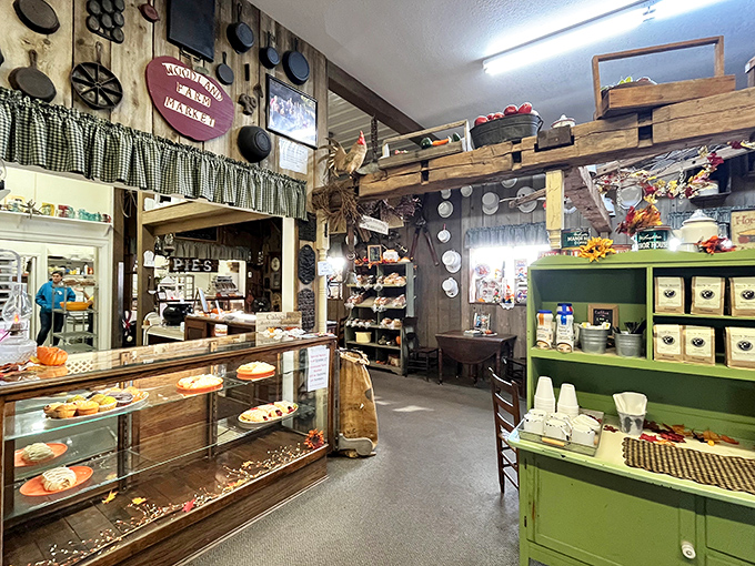 Step inside to discover walls adorned with vintage cookware and country charm, a museum of flavor where every corner tells a story.