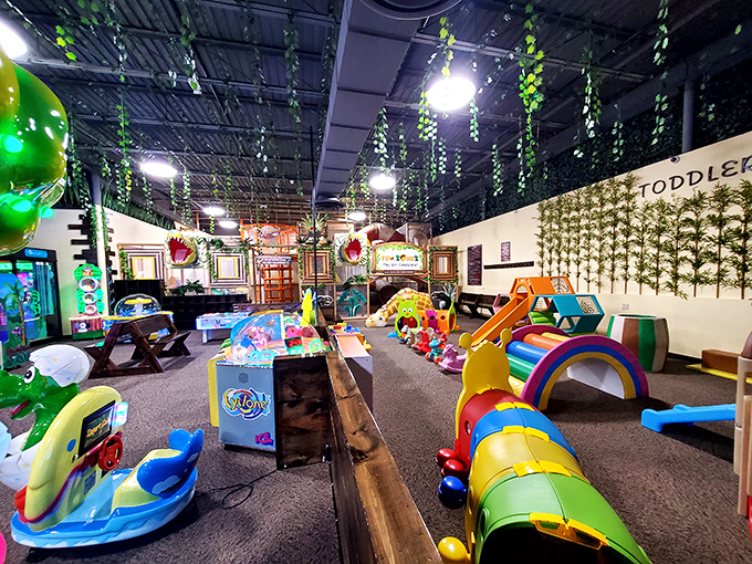 The toddler zone offers a cushioned wonderland where tiny explorers can safely roam while parents watch from nearby comfort zones.