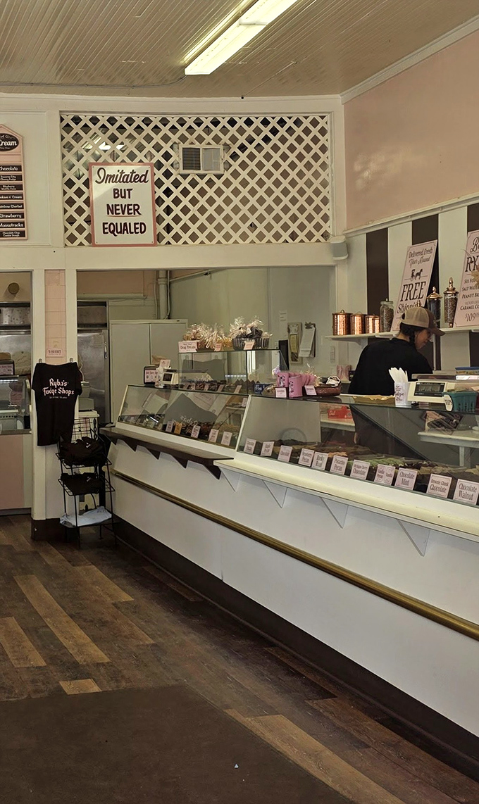 Inside Ryba's, the pristine counter and lattice-adorned walls create a nostalgic backdrop for serious fudge business. "Imitated BUT NEVER EQUALED" indeed!