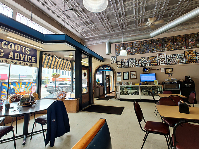 Inside, the bakery's vintage charm shines with tin ceilings, while police patches and memorabilia create a uniquely themed dining experience.