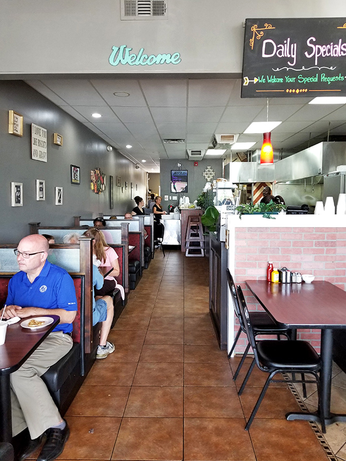 Step inside to a warm welcome where cozy booths and friendly faces create that "everybody knows your name" vibe, minus the bar tabs.