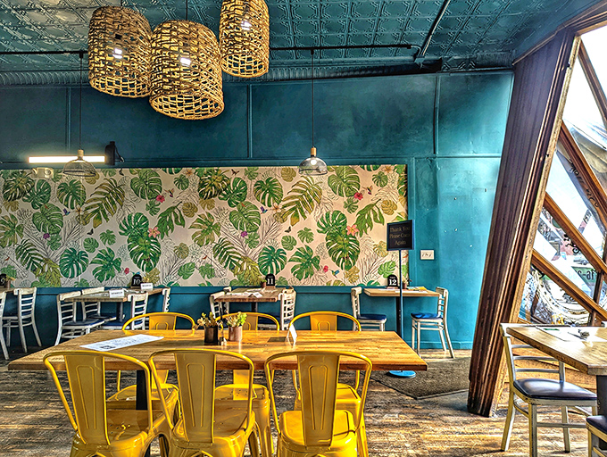 Turquoise dreams and tropical schemes &ndash; the dining room's vibrant ceiling and woven basket lights transport you straight to island time.