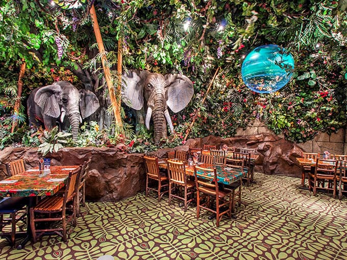 Dining beneath a canopy of artificial trees while elephants watch from above beats your usual Tuesday night restaurant by a considerable margin.