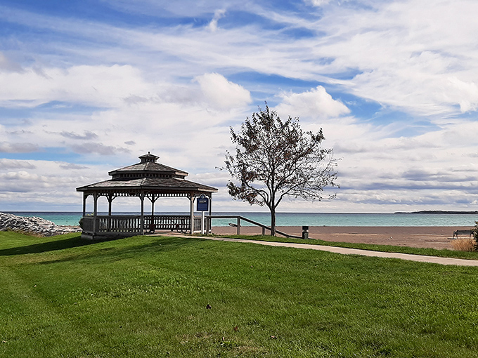 The charming lakeside gazebo offers the perfect vantage point for spectacular Lake Huron sunrises and peaceful afternoon contemplation.