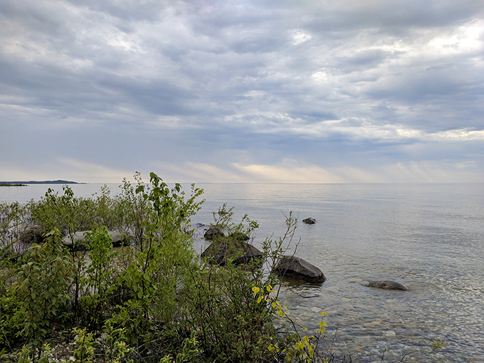 Mother Nature showing off her watercolor skills where sky meets lake in a seamless blend of blues.