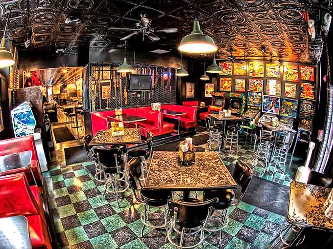 Step inside to discover a wonderland of checkered floors, red vinyl booths, and vintage arcade cabinets&mdash;where the '80s never ended but the food got better.