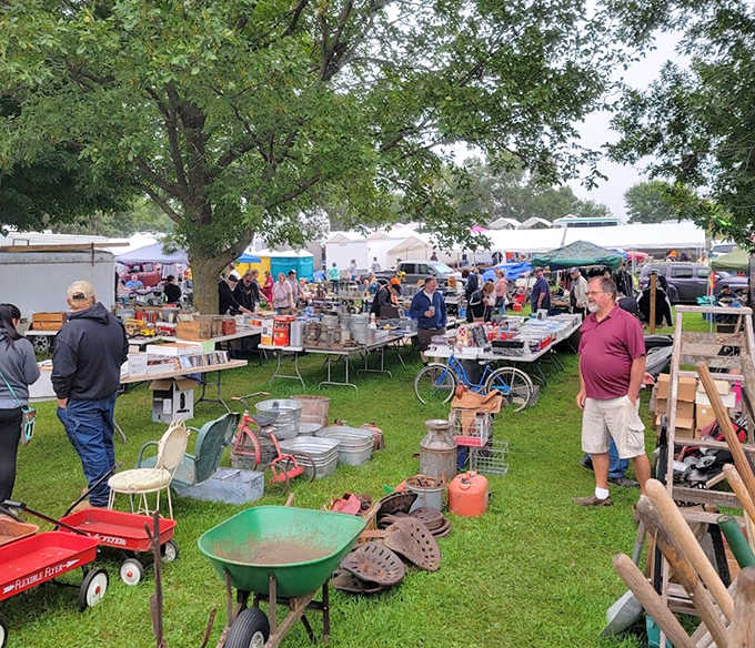Bargain bazaar in full swing: Tables laden with potential treasures create a maze of possibility where shoppers hunt for that perfect something they didn't know they needed.