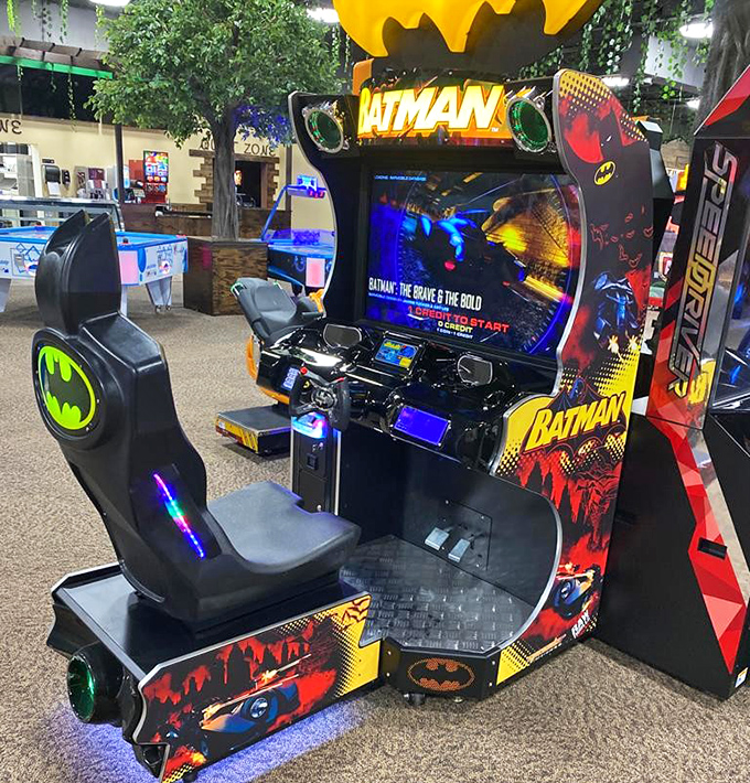 Holy high-speed adventure, Batman! This sleek racing game lets visitors channel their inner caped crusader while dinosaurs lurk in the background.