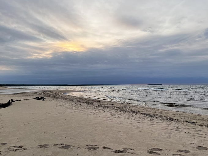 Even on cloudy days, Au Train Beach captivates with its moody beauty and expansive shoreline waiting to be explored.