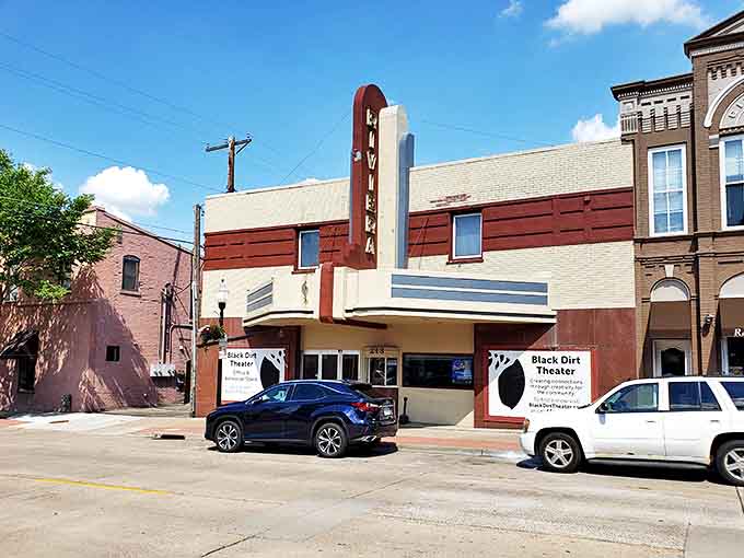 The Black Dirt Theater's vintage marquee stands as a beacon of culture in this riverside town, hosting everything from plays to film festivals.