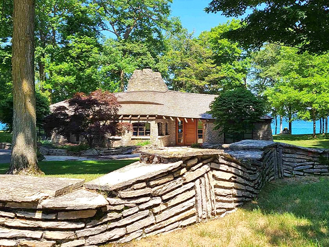 Lakeside living gets the fairy tale treatment with this stone masterpiece, where every boulder was hand-selected to create nature-inspired harmony.