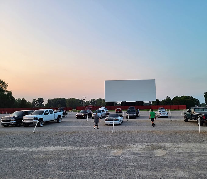 A glimpse of the Capri's entrance through the rearview mirror, where gravel roads lead to celluloid dreams and summer memories waiting to be made.