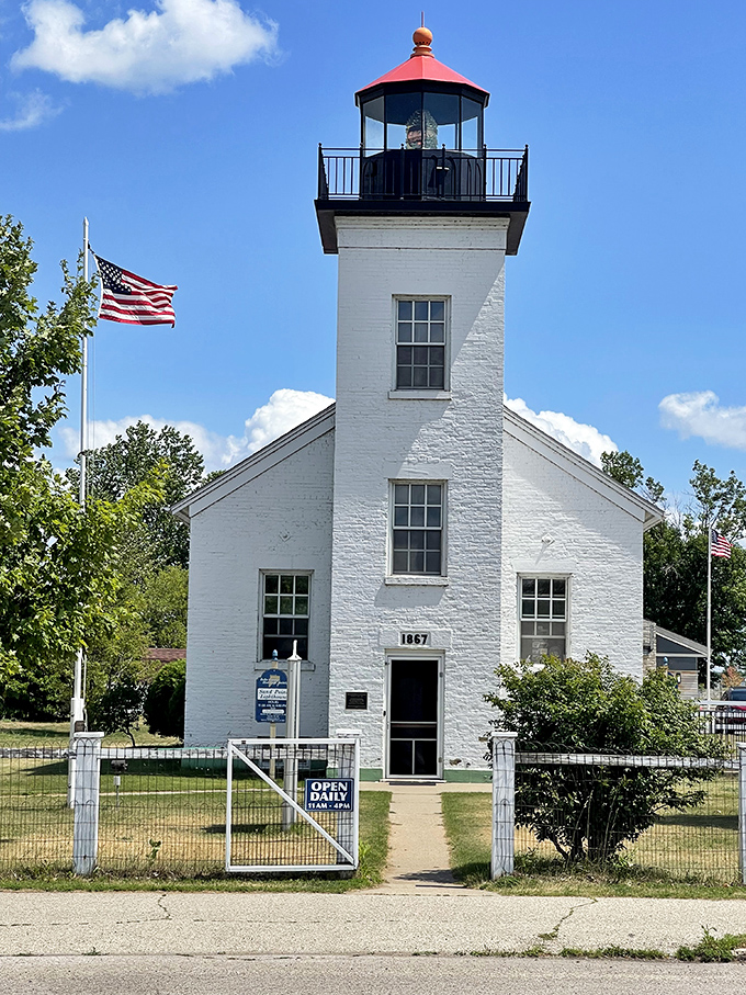 That doorway has seen 150 years of keepers, visitors, and possibly one restless spirit who never quite checked out.