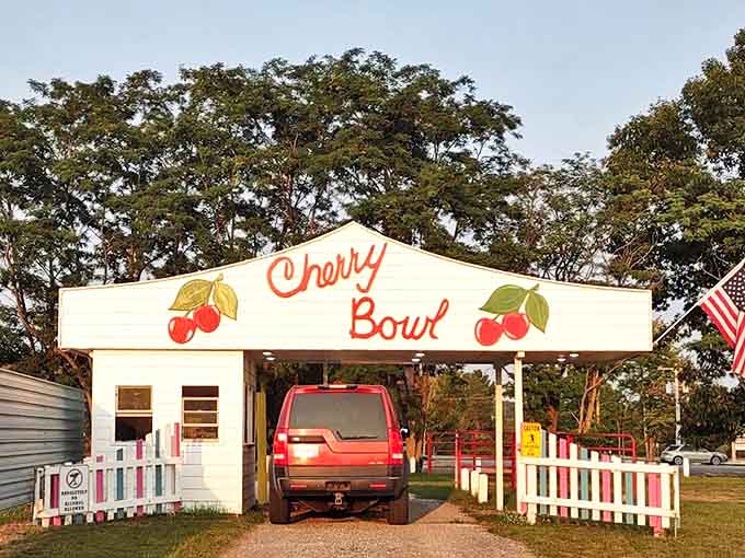 Cherry-adorned entrance booth welcomes visitors to a simpler time. Your ticket isn't just for a movie&mdash;it's for a memory.
