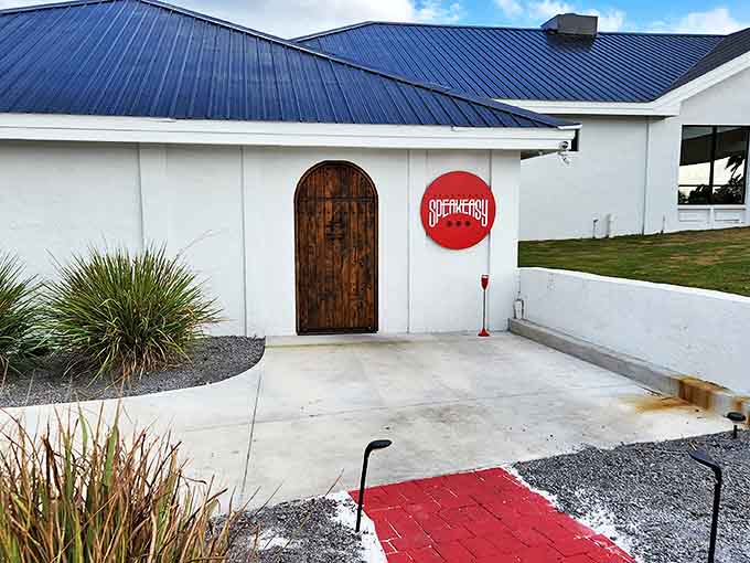 Fork and Flame at Speakeasy offers a modern twist on classic flavors, with a rustic-chic entrance that hints at the culinary treasures within.