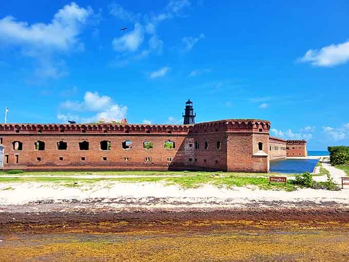 Fort Jefferson's imposing brick walls have witnessed centuries of history, now guarding nothing but pristine beaches and unforgettable memories.