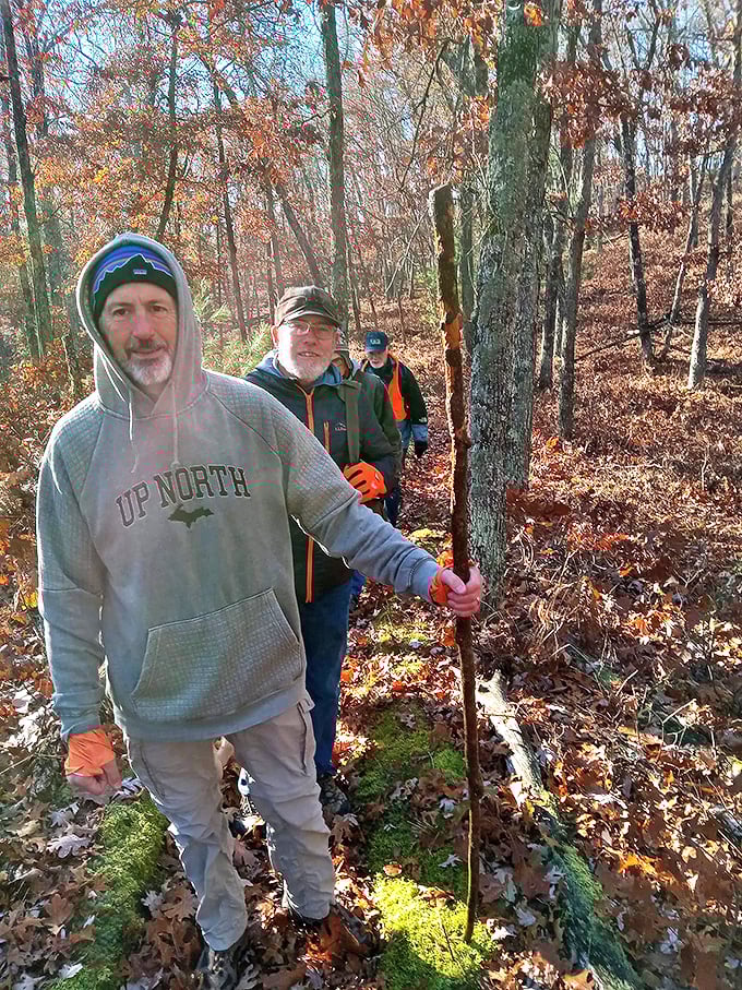 The hiking brotherhood in action &ndash; walking sticks in hand, these trail veterans know the forest holds stories better than any bestseller.