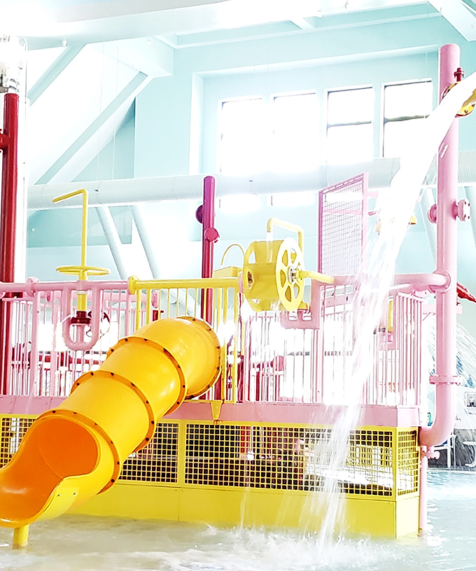 Colorful slides and playful water features create a tropical paradise inside, where it's always 84 degrees regardless of Michigan's notorious weather outside.