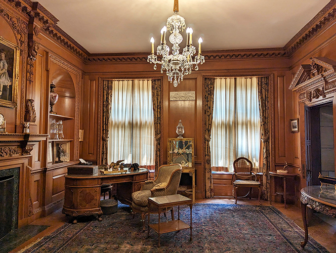 This wood-paneled study features craftsmanship so exquisite it makes modern contractors mutter, "They don't make 'em like this anymore."