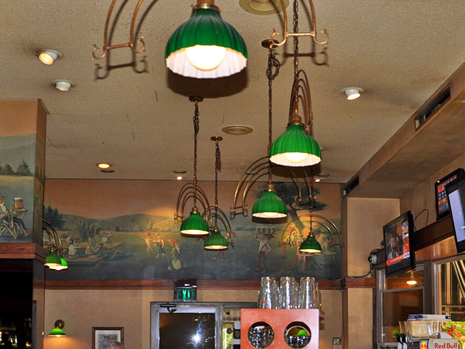 The Leprechaun Lounge beckons with its signature green banker's lamps, creating a warm glow that makes everyone look like they're having the time of their lives.