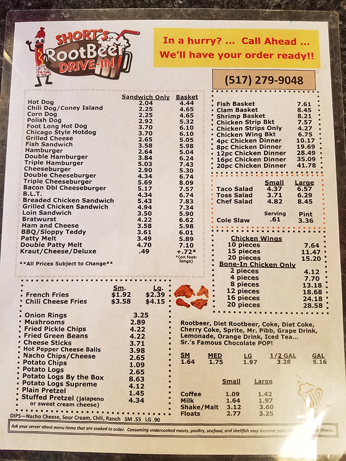 The menu board showcases decades of American drive-in favorites, tempting hungry visitors with choices that haven't changed for generations.