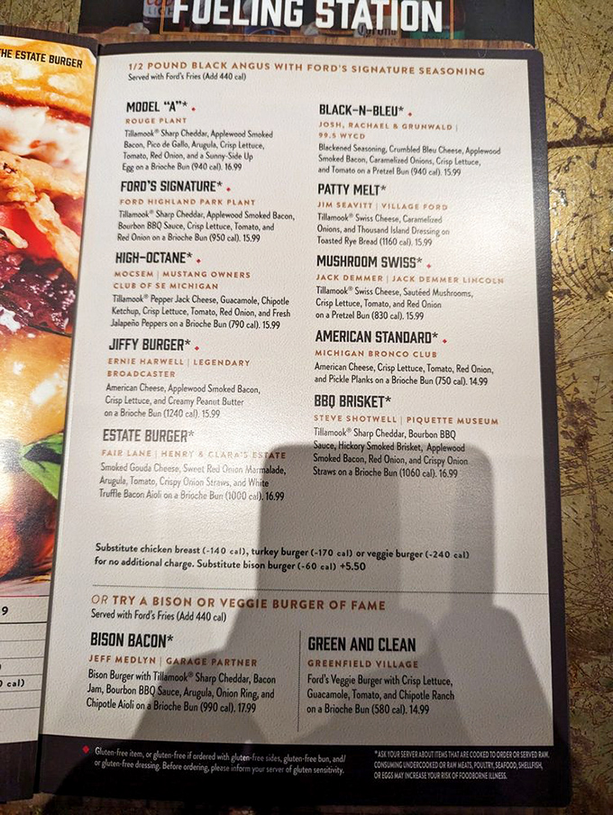 The menu showcases Ford's signature burgers, each arriving with the iconic Ford logo branded right onto the bun, a detail that delights first-timers.