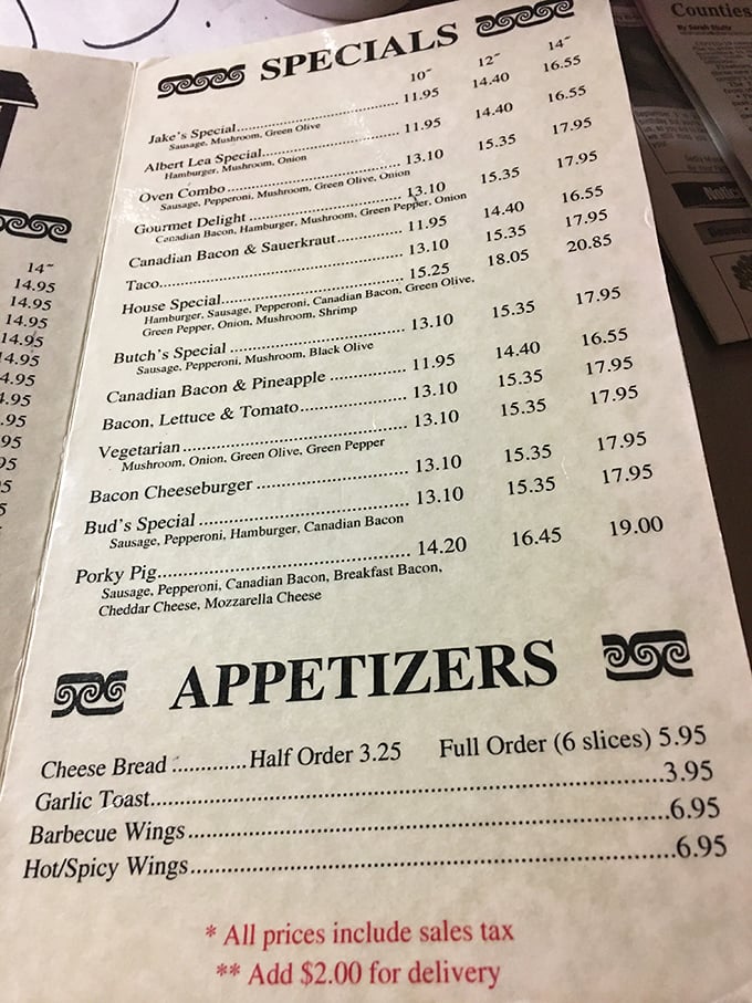 The menu at Jake's reads like a love letter to pizza enthusiasts, with specialties that have earned their place through decades of deliciousness.