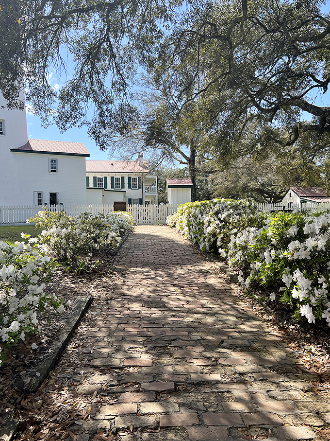 White azaleas line the brick pathway leading to history's doorstep &ndash; a journey through time that's gentler on the feet than the stairs ahead.