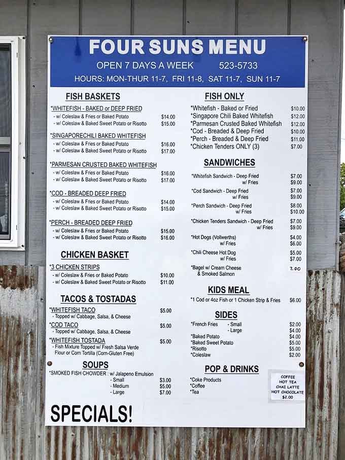 The blueprint for happiness, spelled out in fish. This no-nonsense menu board promises simple pleasures that fancy restaurants can only dream of delivering.