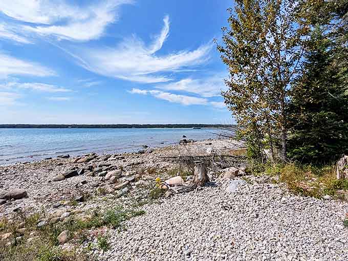 Crystal clear waters mirror the sky, creating a paddler's paradise where time seems to stand perfectly still.