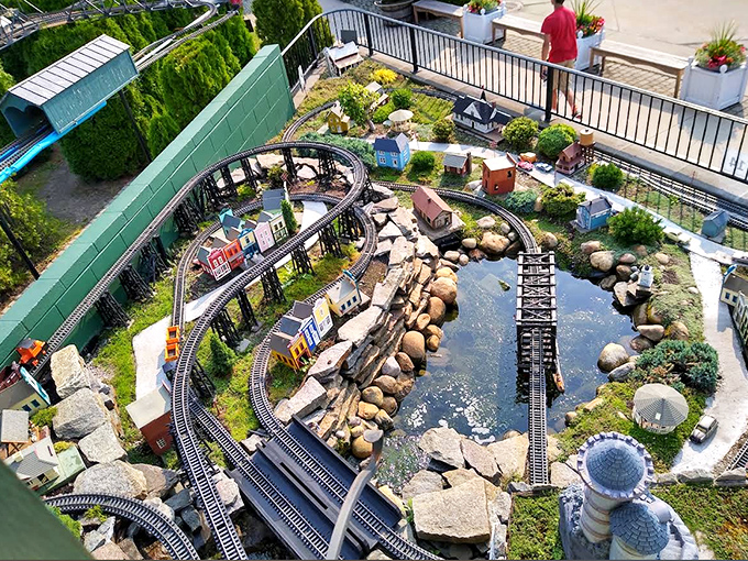 Tiny trains chug through miniature landscapes, creating a world where giants like us can play conductor for an afternoon.