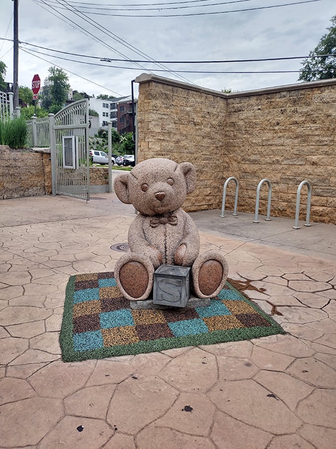 Another teddy friend greets visitors at the park entrance, silently promising adventures to children of all ages.