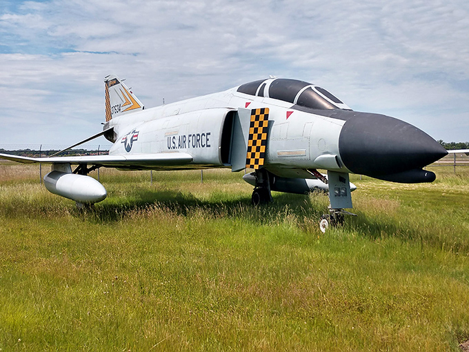 The sleek F-4 Phantom commands respect with its no-nonsense design, a supersonic reminder of American air superiority during the Cold War era.