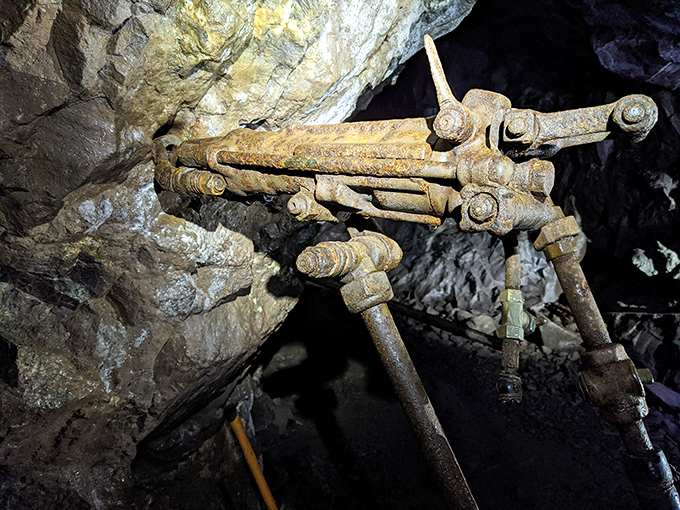 This isn't museum-quality stuff behind glass, folks. Real mining equipment sits exactly where workers left it generations ago.