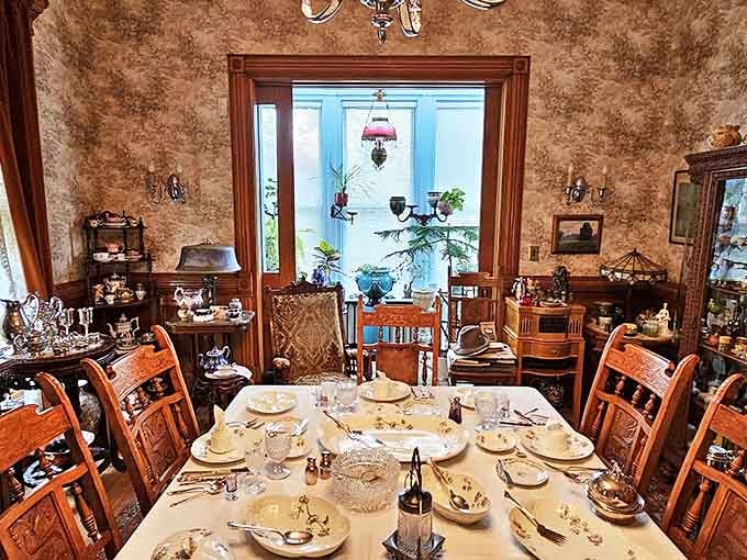 The dining room table set for an elegant Victorian meal &ndash; when dinner was an event, not just refueling between Netflix episodes.
