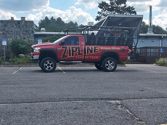 Zipline Tour Truck: Your chariot to adventure awaits! This rugged beauty has transported more nervous laughs and shaky knees than a first-date limo service.