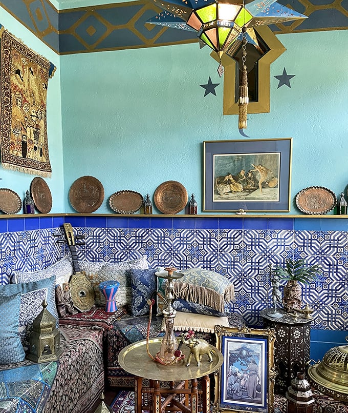 Antique Collections: Blue walls and intricate tiles create the perfect backdrop for treasures that span continents and centuries.