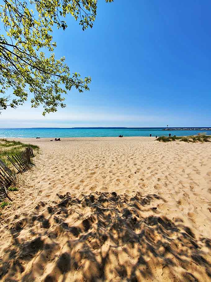 Golden sands stretch invitingly along Van's Beach, soft as powdered sugar and twice as sweet for tired feet after a day of treasure hunting.