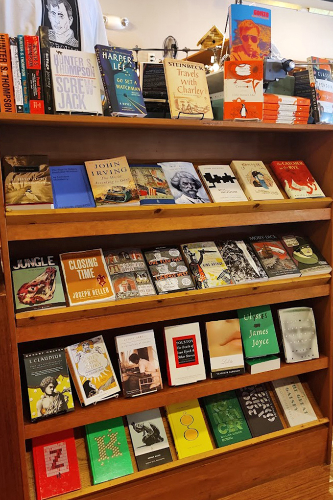 Literary treasures from Steinbeck to Thompson line these shelves, promising adventures without leaving your comfortable chair.