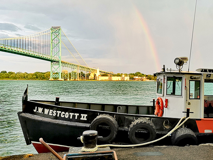 Even Mother Nature celebrates this floating postal marvel, painting the sky with rainbows as the Westcott passes beneath Detroit's Ambassador Bridge.
