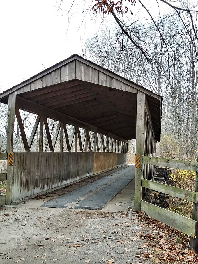 This isn't just a covered bridge &ndash; it's a time portal where modern worries dissolve into the rhythmic echo of wheels on wood.