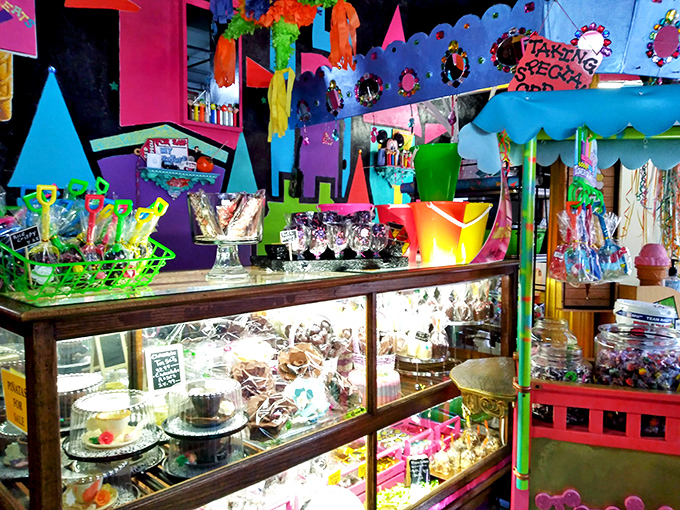 Glass cases protect chocolate masterpieces like museum artifacts, except here, you're encouraged to devour the exhibits.